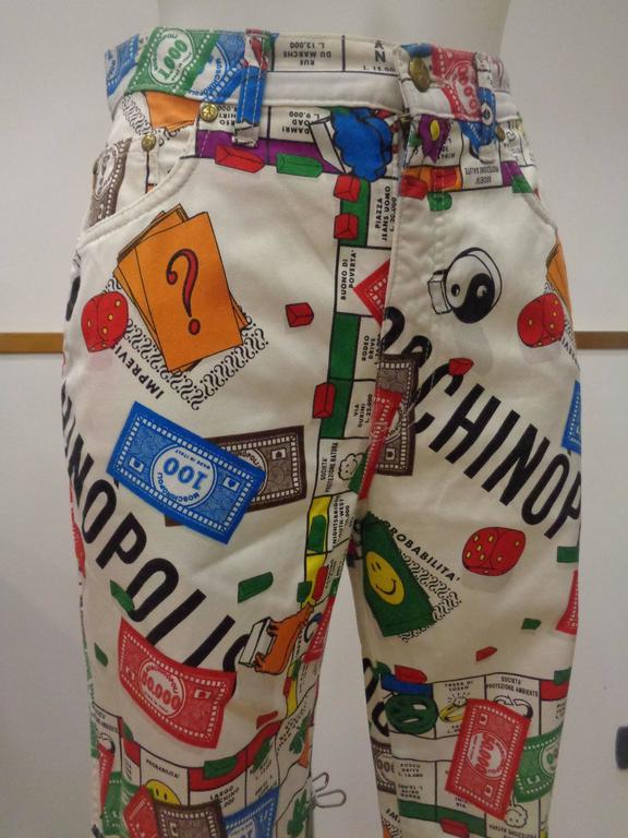 Rare Moschino Iconic Collection "Moschinopoly" Print trousers at 1stDibs