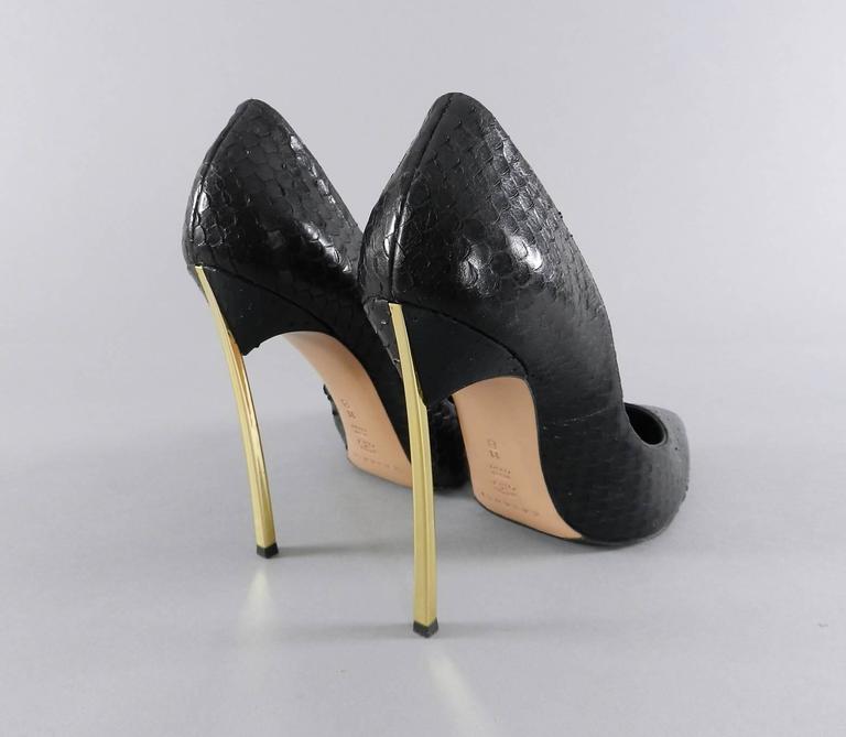 Casadei Black Python Snakeskin Pumps With Gold Metal Stiletto Heel at 1stDibs