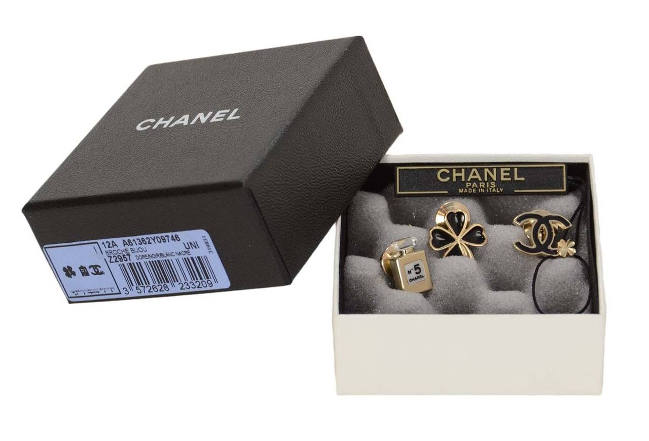 CHANEL Blk/Gold Set of Three CC, Clover, No 5 Perfume Bottle Pins at ...