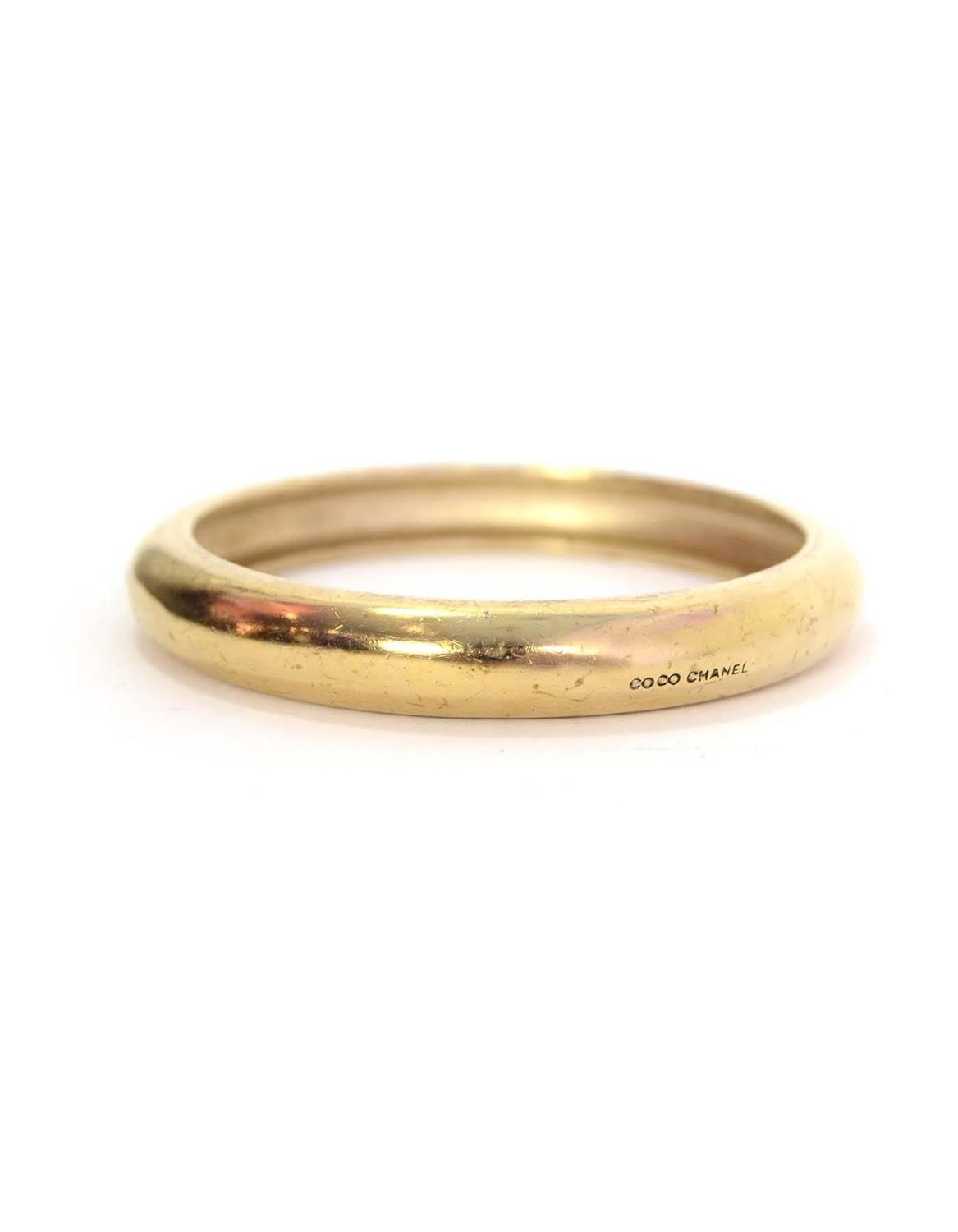 Chanel Gold French Script Bangle Bracelet For Sale at 1stdibs