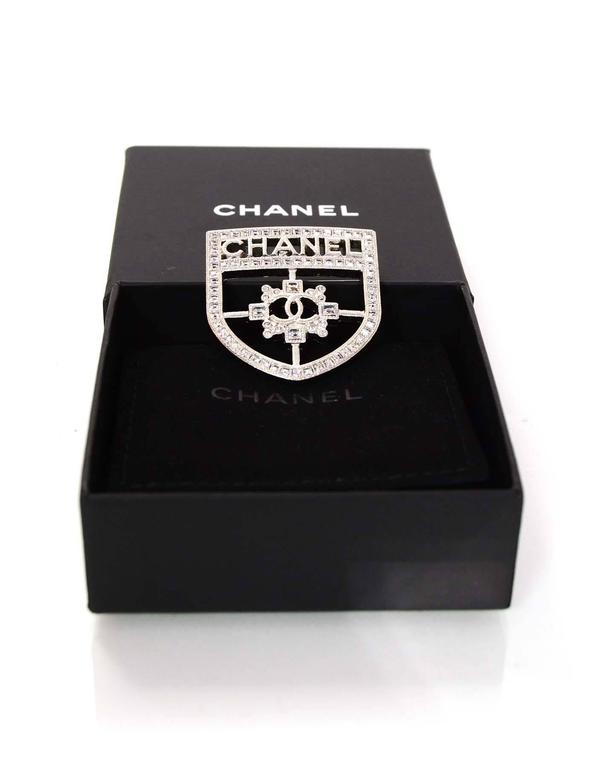 Chanel 2016 Silvertone Crystal CHANEL Shield Brooch For Sale at 1stDibs ...