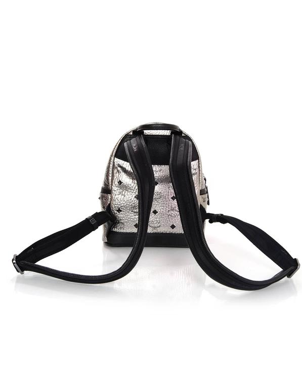 MCM Silver Canvas Monogram Black Crystal Studded Mini Backpack Bag at ...