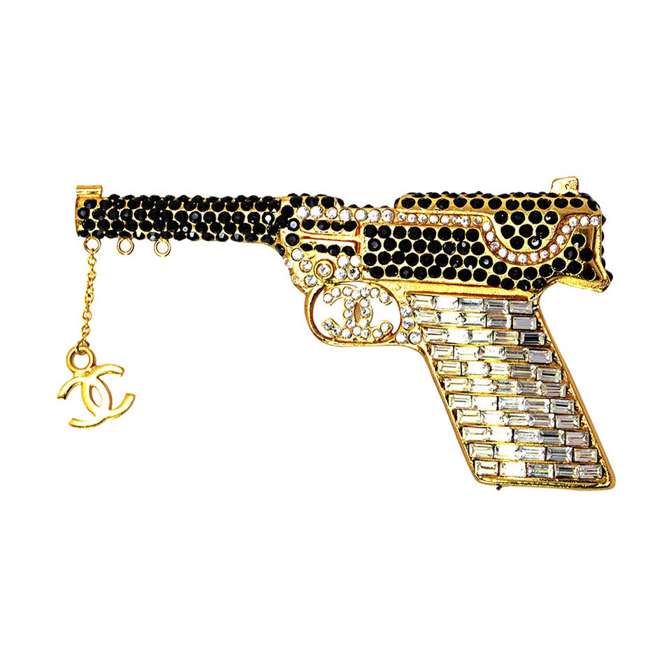CHANEL 2001 Black and Clear Rhinestone Goldtone Gun Pin at 1stDibs ...