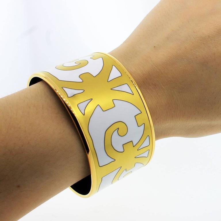 Hermes Gold Tone/White Extra Wide Enamel T Stamp Bangle Bracelet at ...
