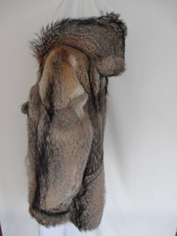 Rustic wolf hooded fur jacket at 1stdibs