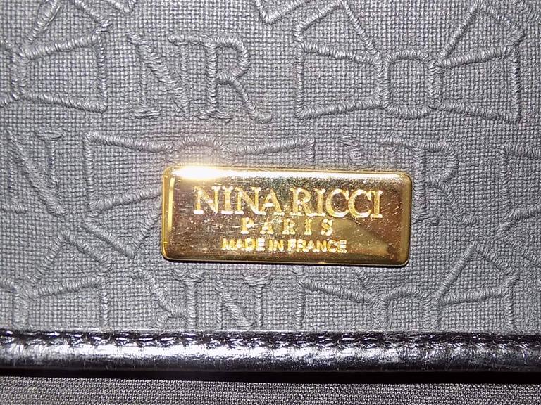 Nina Ricci black coated canvaswith gold chain bag / clutch For Sale at ...