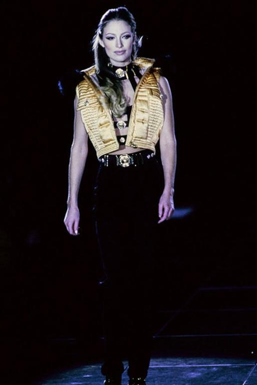 Gianni Versace's most famous Fall 1992 collection satin pufer vest very ...