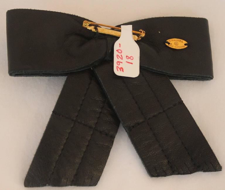 Chanel Black Leather Bow Pin - Circa Late 70's at 1stDibs