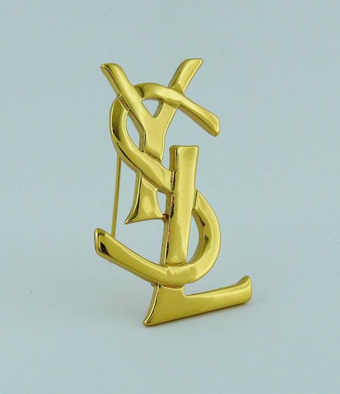 Yves Saint Laurent YSL Gold Toned Logo Brooch at 1stDibs | ysl logo ...