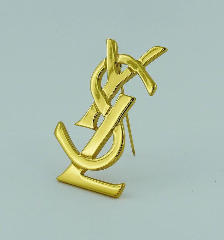 Yves Saint Laurent YSL Gold Toned Logo Brooch at 1stDibs | ysl logo ...