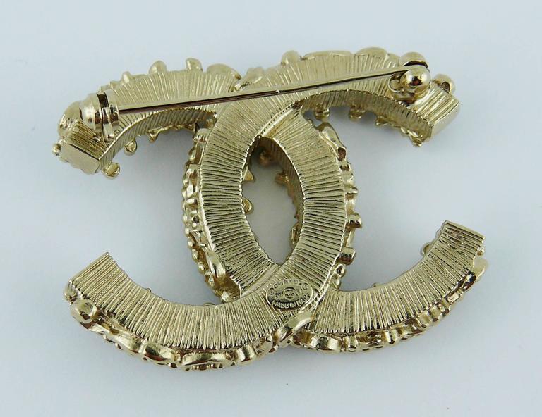 Chanel Black Enamel Baroque Logo Brooch at 1stDibs | chanel baroque ...