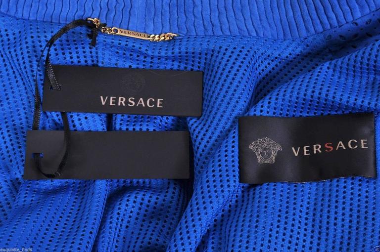 VERSACE LASER CUT SUEDE LEATHER with BAROCCO APPLIQUE JACKET at 1stDibs