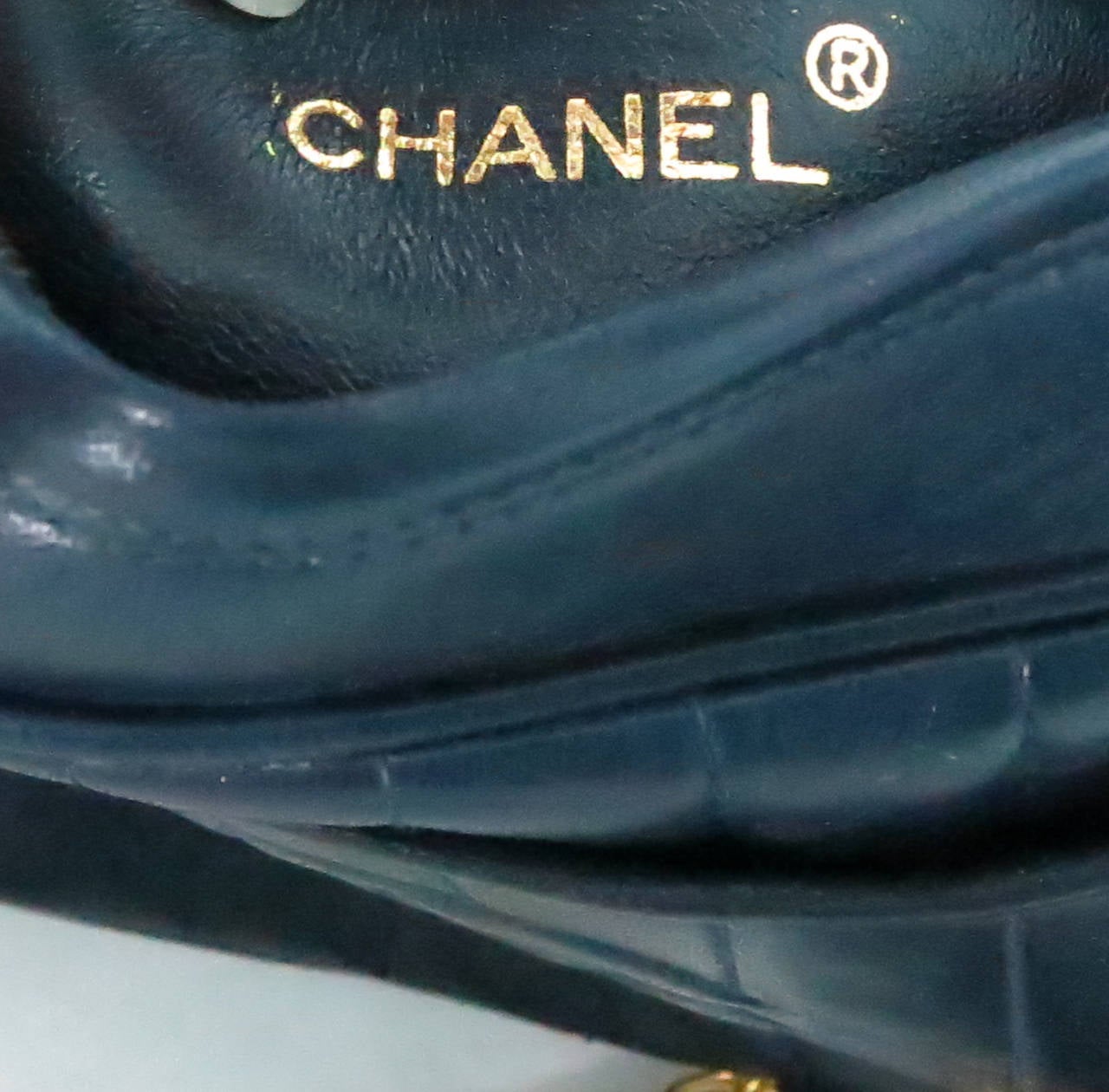 1980s Chanel navy blue lambskin camera bag with tassel at 1stDibs