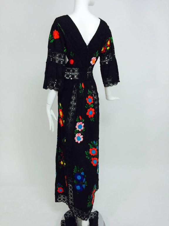 Vintage colourfully embroidered black cotton and lace Mexican maxi ...