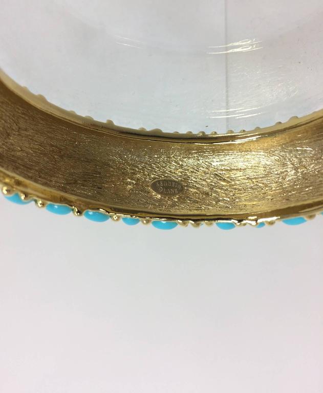Kenneth Lane turquoise cabochon encrusted gold clamper bracelet at 1stDibs