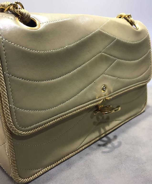 Chanel Early 90s Beige Lambskin Gold Chain Flap Bag at 1stDibs | 90's ...