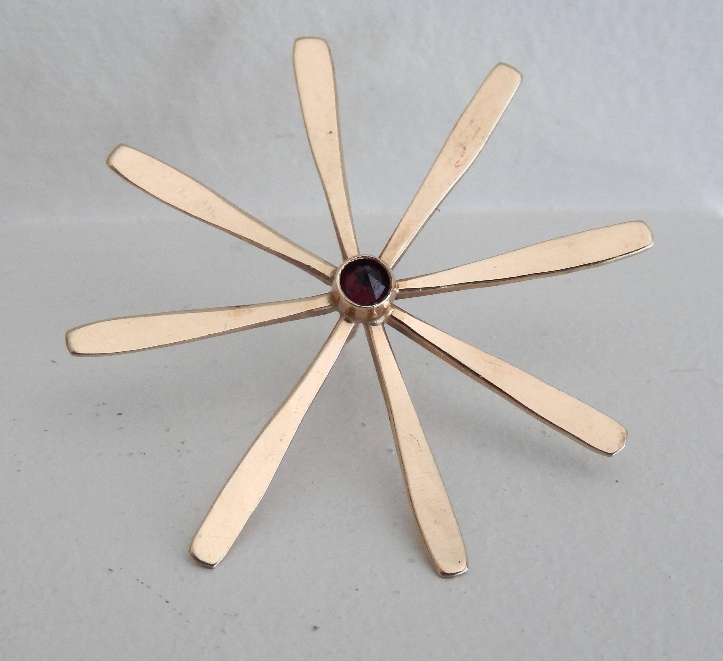 Ed Levin Mid-Century Gold and Garnet Starburst Pin For Sale at 1stDibs