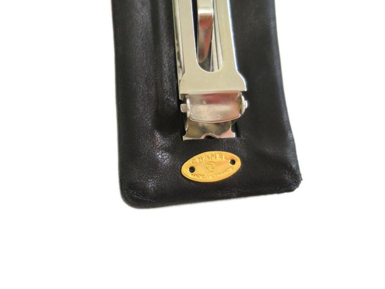 Chanel Black Lambskin Leather and Gold CC Hair Barrette at 1stDibs