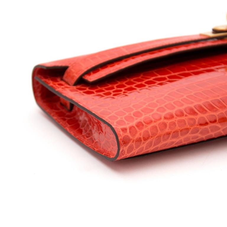 Hermès Brand New Kelly Cut Pochette Crocodile Porosus Lisse Orange at ...