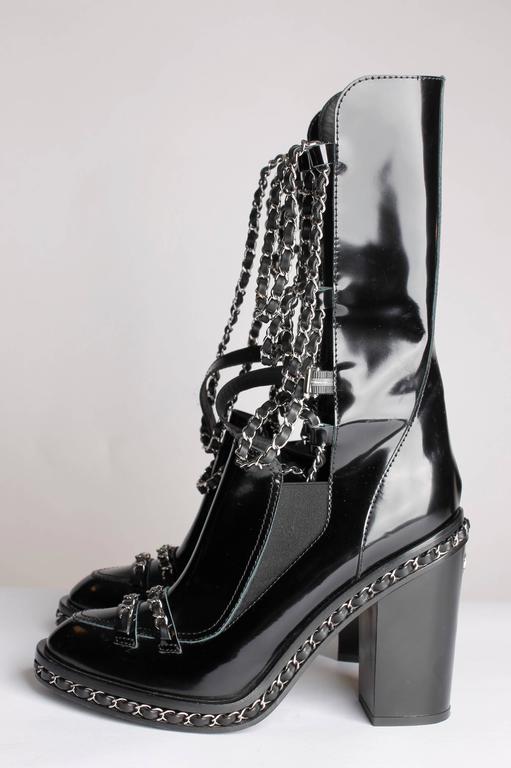 Chanel Chain Boots - black leather / silver at 1stDibs | chanel boots ...