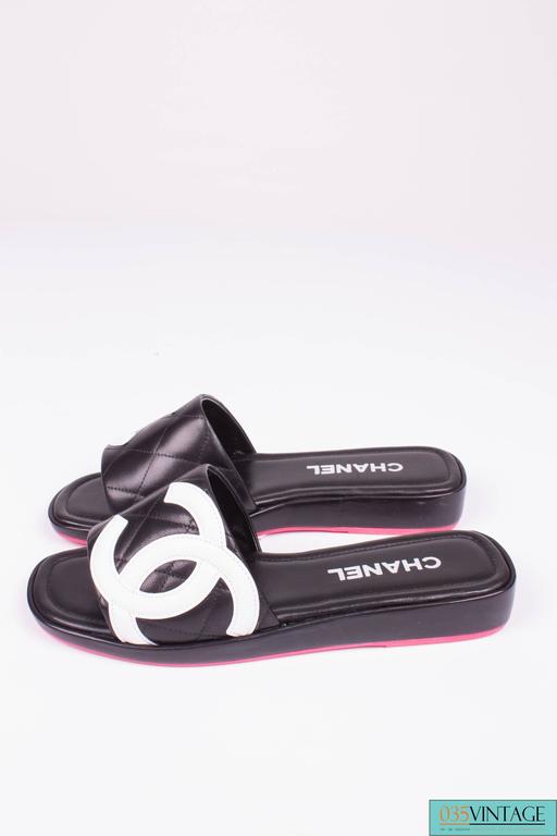 Chanel Quilted Cambon Slide Sandals - black and white leather at ...