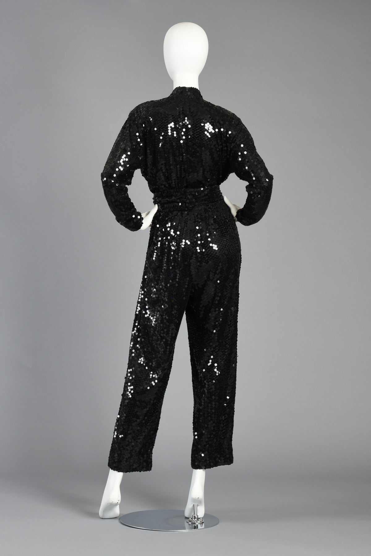 Darling Black Sequin Jumpsuit with Plunging Neckline at 1stDibs