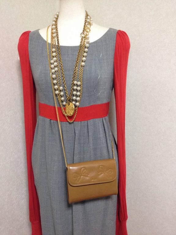 Vintage Nina Ricci tanned brown leather mini clutch shoulder bag with ...