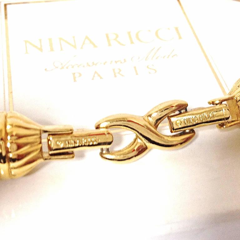 MINT. Vintage Nina RIcci golden chain statement necklace with bow and ...