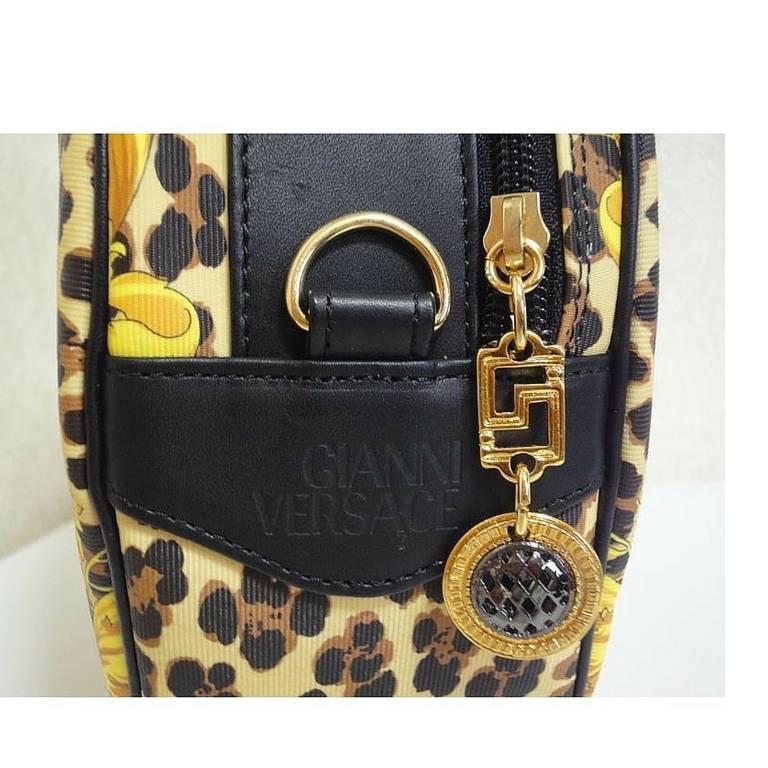MINT. Vintage Gianni Versace leopard and gorgeous print round bag with ...