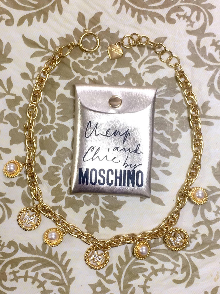 Vintage Moschino statement necklace with golden dangling charms with ...
