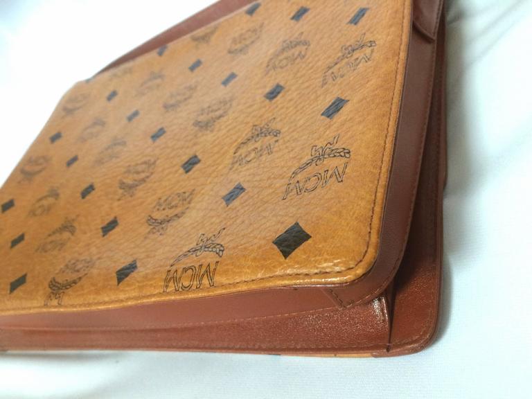 Vintage MCM brown shoulder bag with leather strap, designed by Michael ...