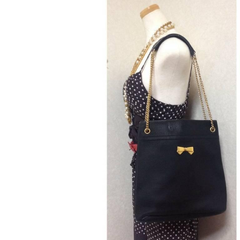 Vintage Nina Ricci black tote bag with golden chain straps with golden ...