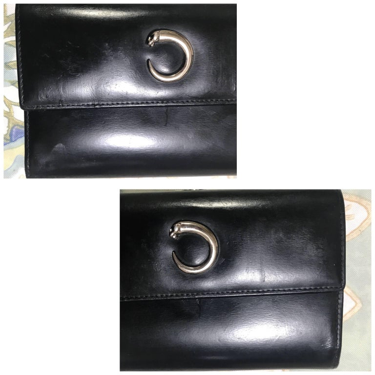 Vintage Cartier black leather wallet with silver tone kiss lock closure ...