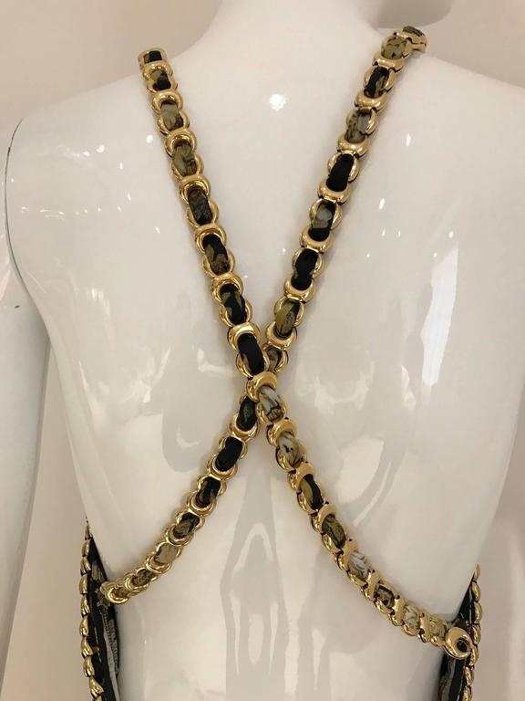 Roberto Cavalli black and gold floral print silk print halter chain top ...