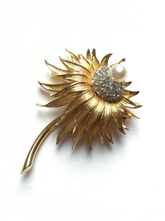Boucher 1950s Brooch Goldtone, Rhinestone and Faux Pearl Flower at 1stDibs