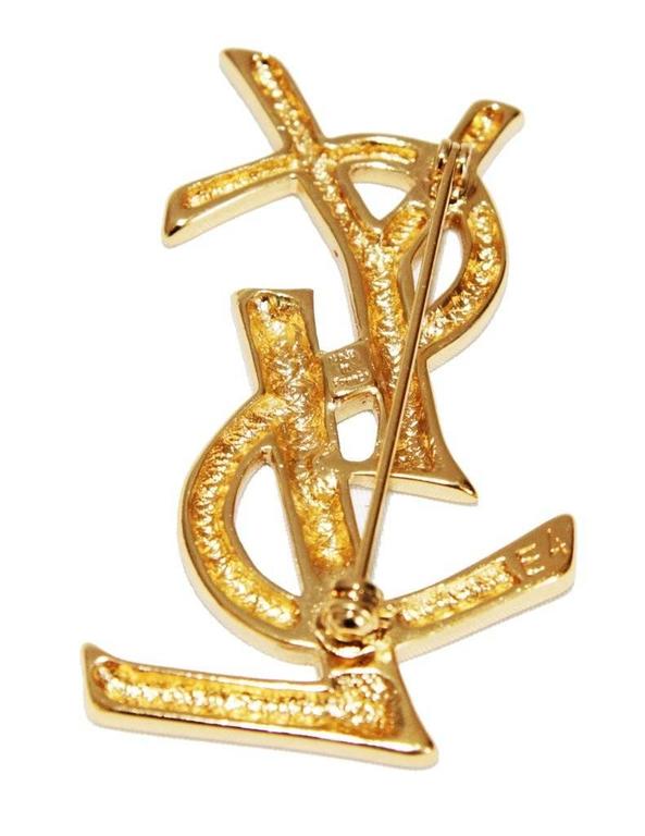YSL logo vintage brooch 80s at 1stDibs