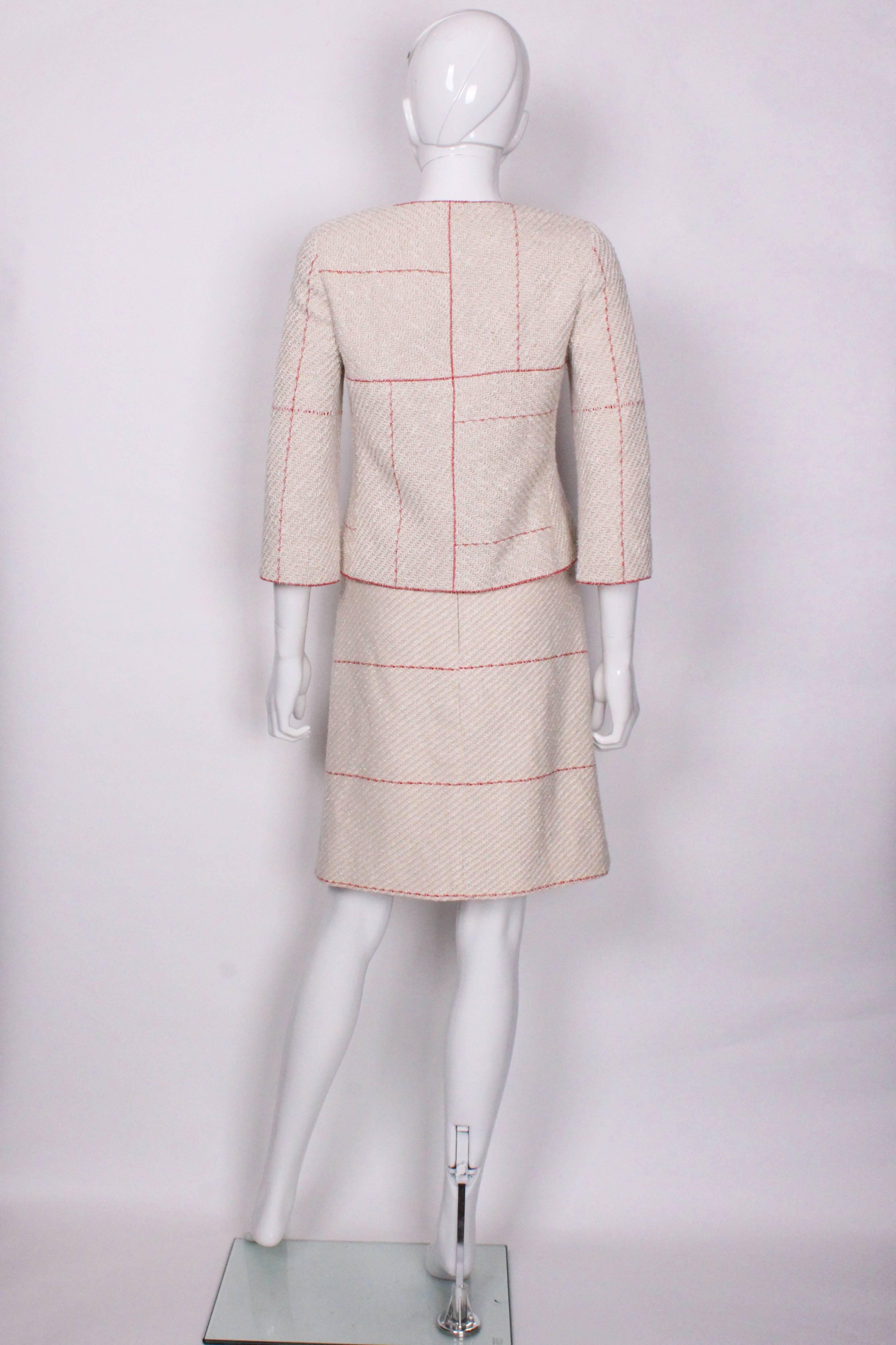 Ivory and Red Chanel Skit Suit at 1stDibs