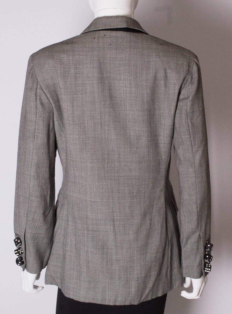 A Vintage 1990s grey button up dice button detail jacket by Moschino ...
