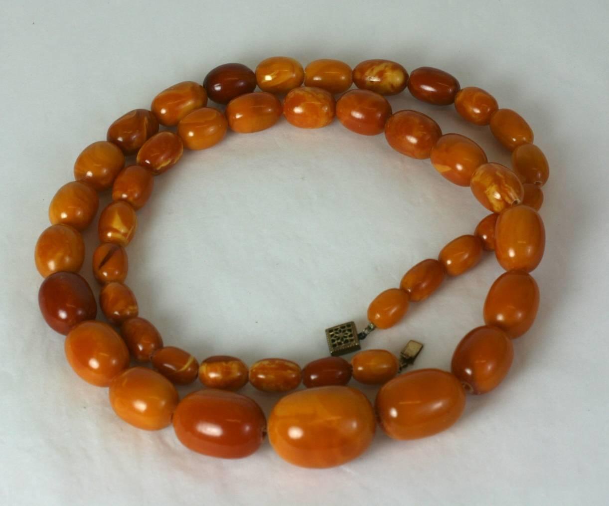 Art Deco Graduated Amber Beads at 1stDibs | art deco beads, amber beads ...