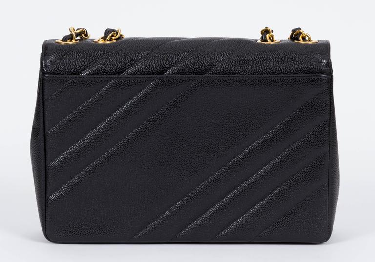 Chanel Black Caviar Diagonal Jumbo Bag at 1stDibs | chanel logo bag