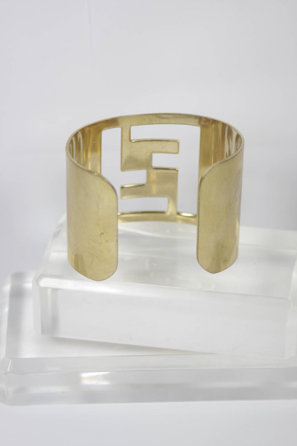 FENDI Gold Tone Logo Cuff at 1stdibs
