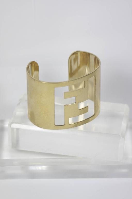 FENDI Gold Tone Logo Cuff at 1stDibs | fendi cuff bracelet, fendi gold ...