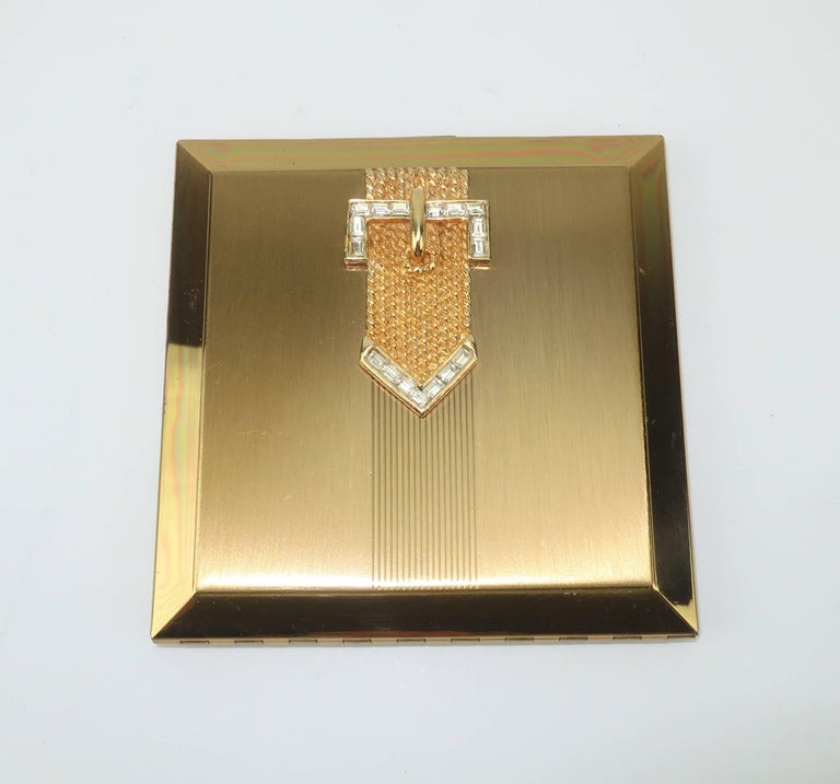 1950's Volupte Gold Powder Compact With Rhinestone Buckle at 1stDibs