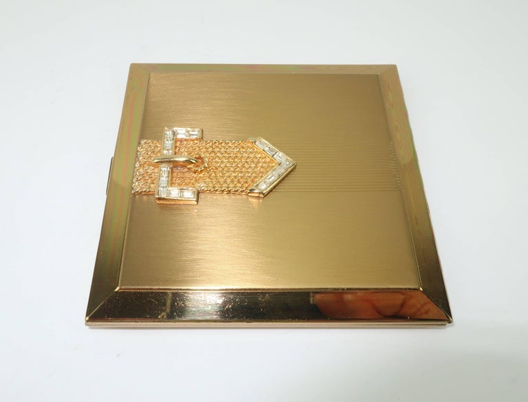 1950's Volupte Gold Powder Compact With Rhinestone Buckle at 1stDibs