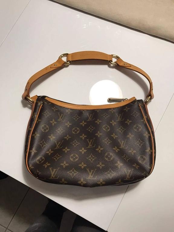 Louis Vuitton Mongram canva and Leather Tulum Shoulder Bag at 1stDibs