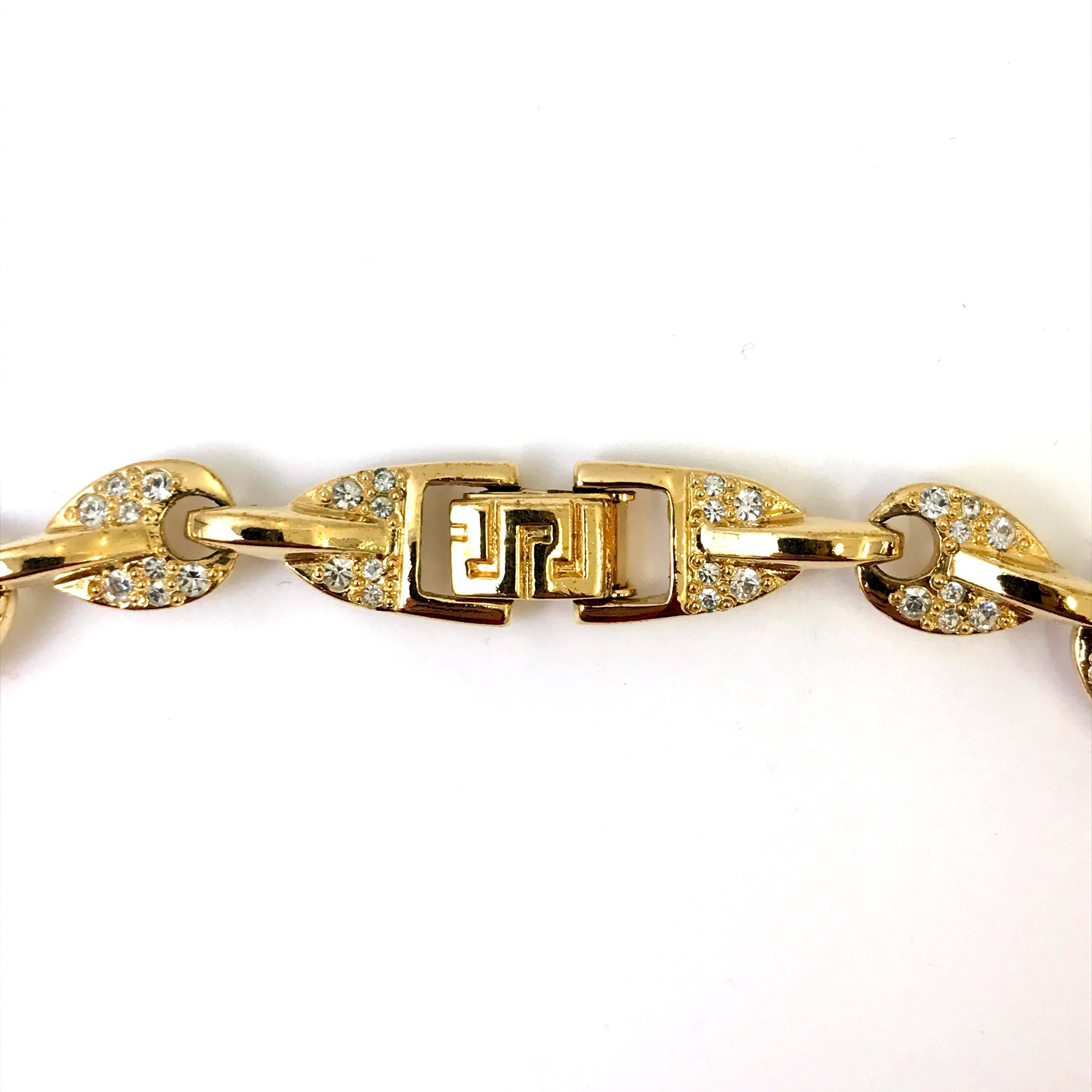 Gianni Versace gold double medusa head necklace with rhinestones, 1990s ...