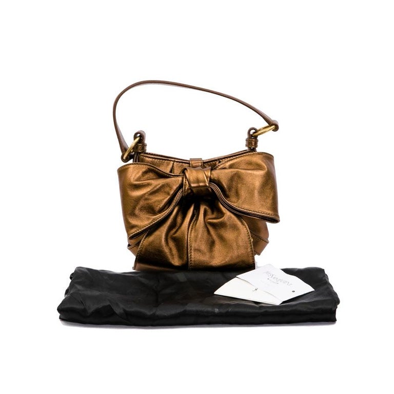YVES SAINT LAURENT 'Bow' Bag in Copper Lambskin at 1stDibs | ysl bow ...