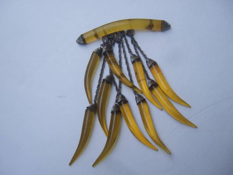 1930s Avant-Garde Amber Color Lucite Claw Brooch at 1stDibs