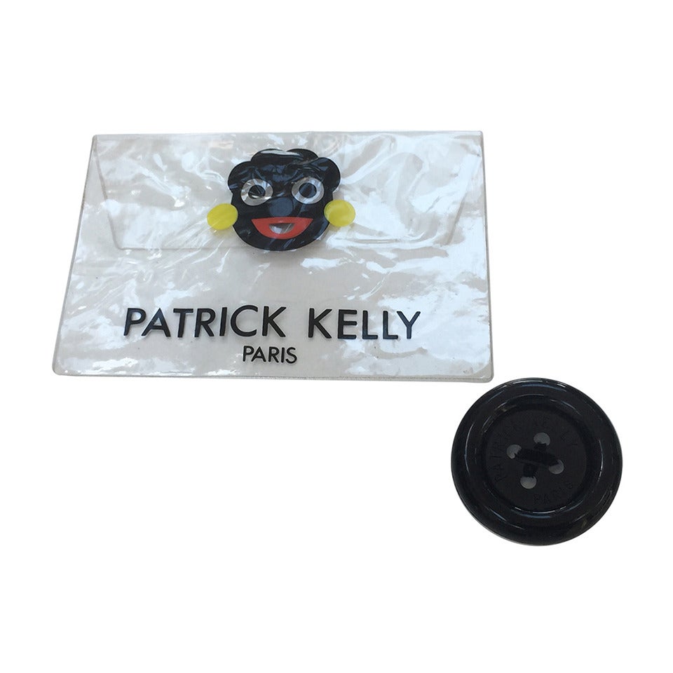 Patrick Kelly Paris black button pin / brooch. at 1stDibs