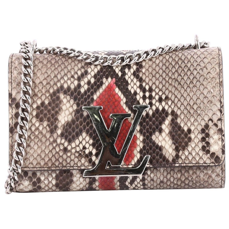 Louis Vuitton Chain Louise Clutch Python GM at 1stDibs | louis vuitton python clutch, louis ...